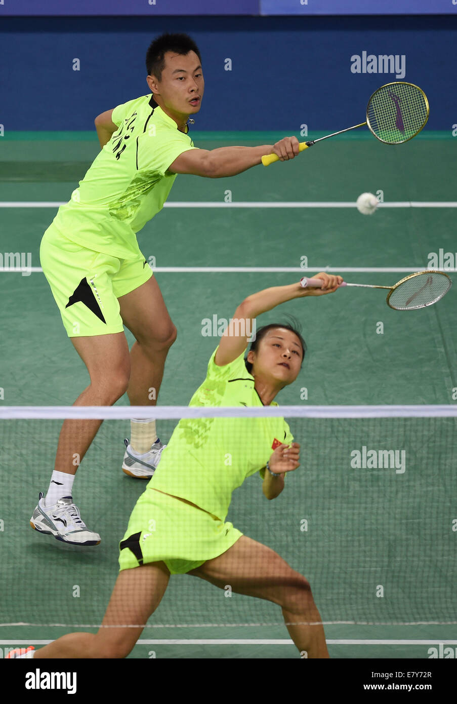 Incheon, South Korea. 26th Sep, 2014. Xu Chen (upper) and Ma Jin of ...