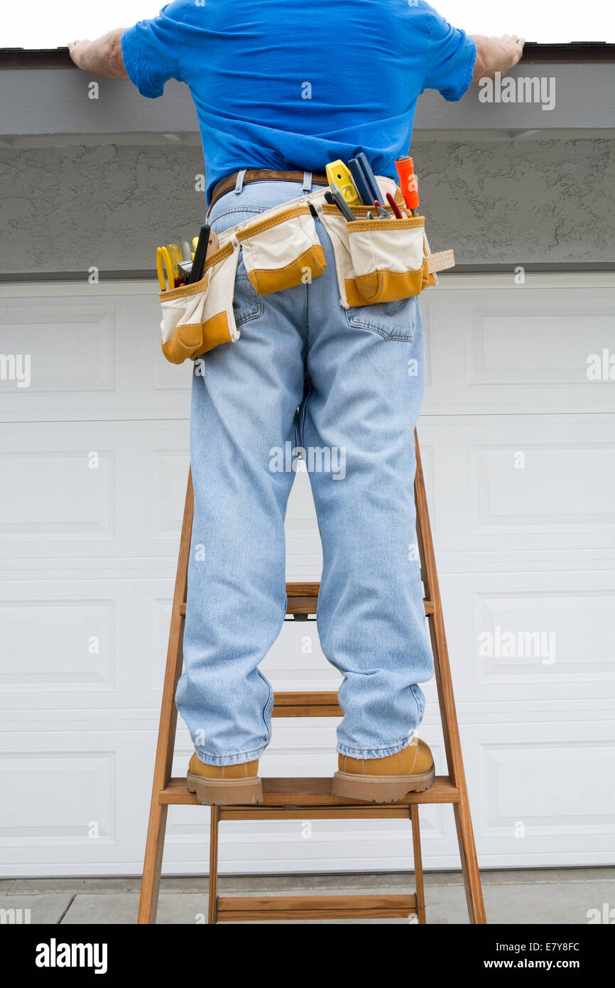 Construction worker holding ladder hi-res stock photography and images ...
