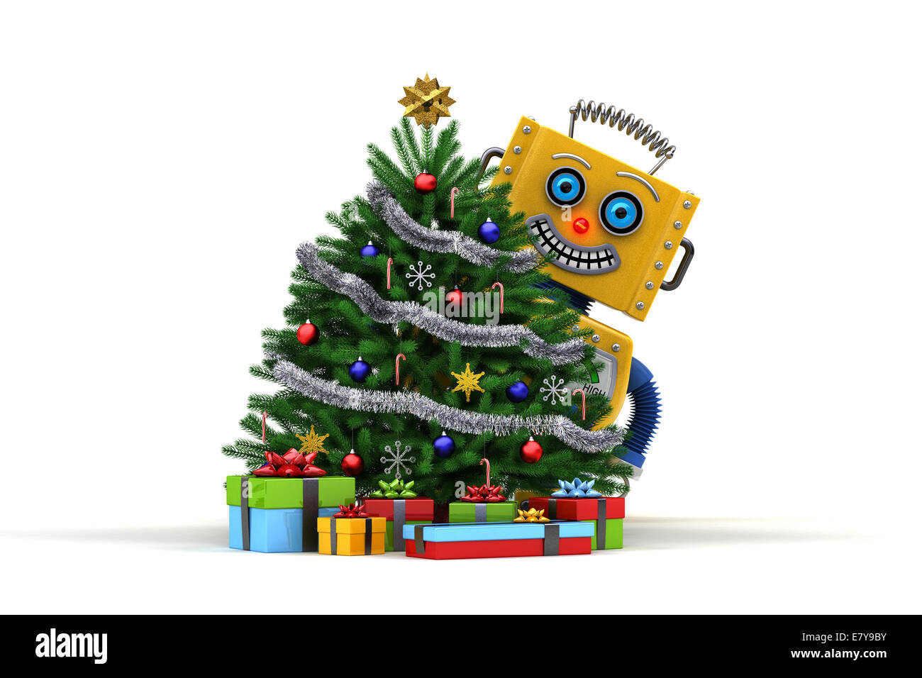 Yellow toy robot standing behind Christmas tree Stock Photo - Alamy
