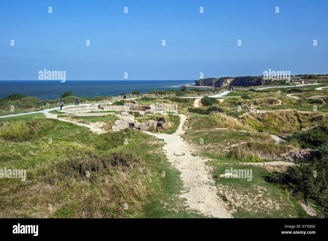 View over bombed Second World War Two German concrete casements and gun ...