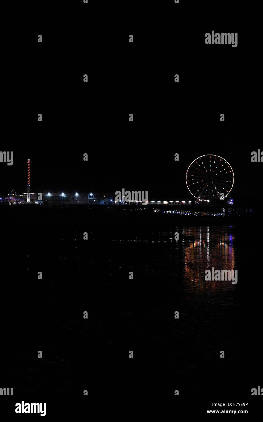 Night beach portrait, with wheel reflections, south to Central Pier ...