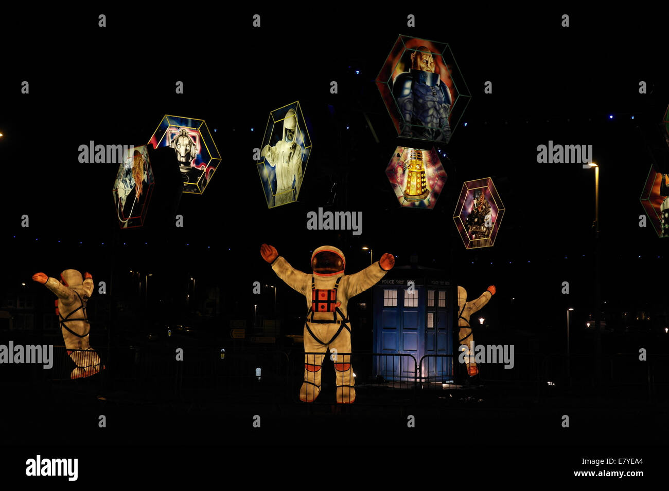 Night view images Dr Who Monsters and three astronauts around blue ...