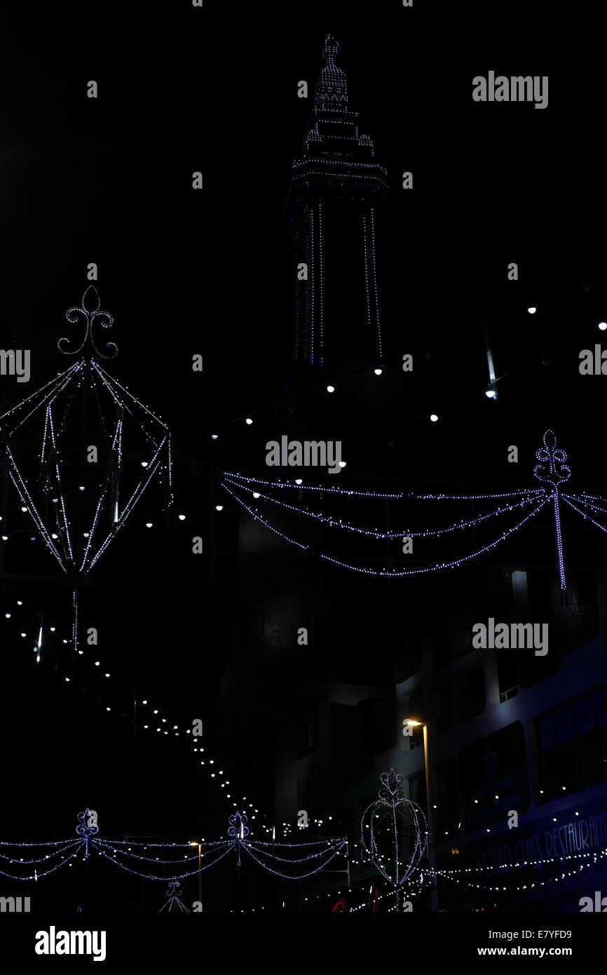 Night portrait electric lights Blackpool Tower rising above blue LED ...