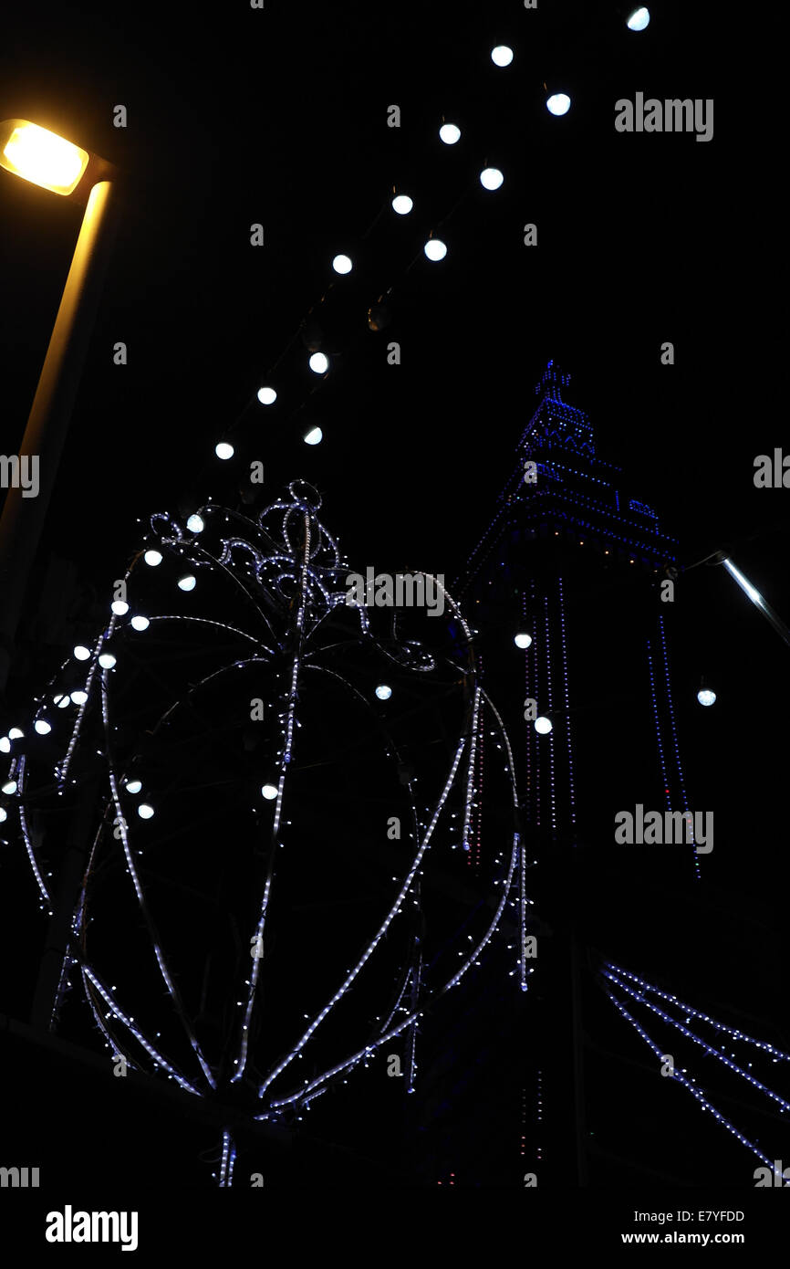 Blackpool tower 1 blue colours illuminated standing rising centre ...