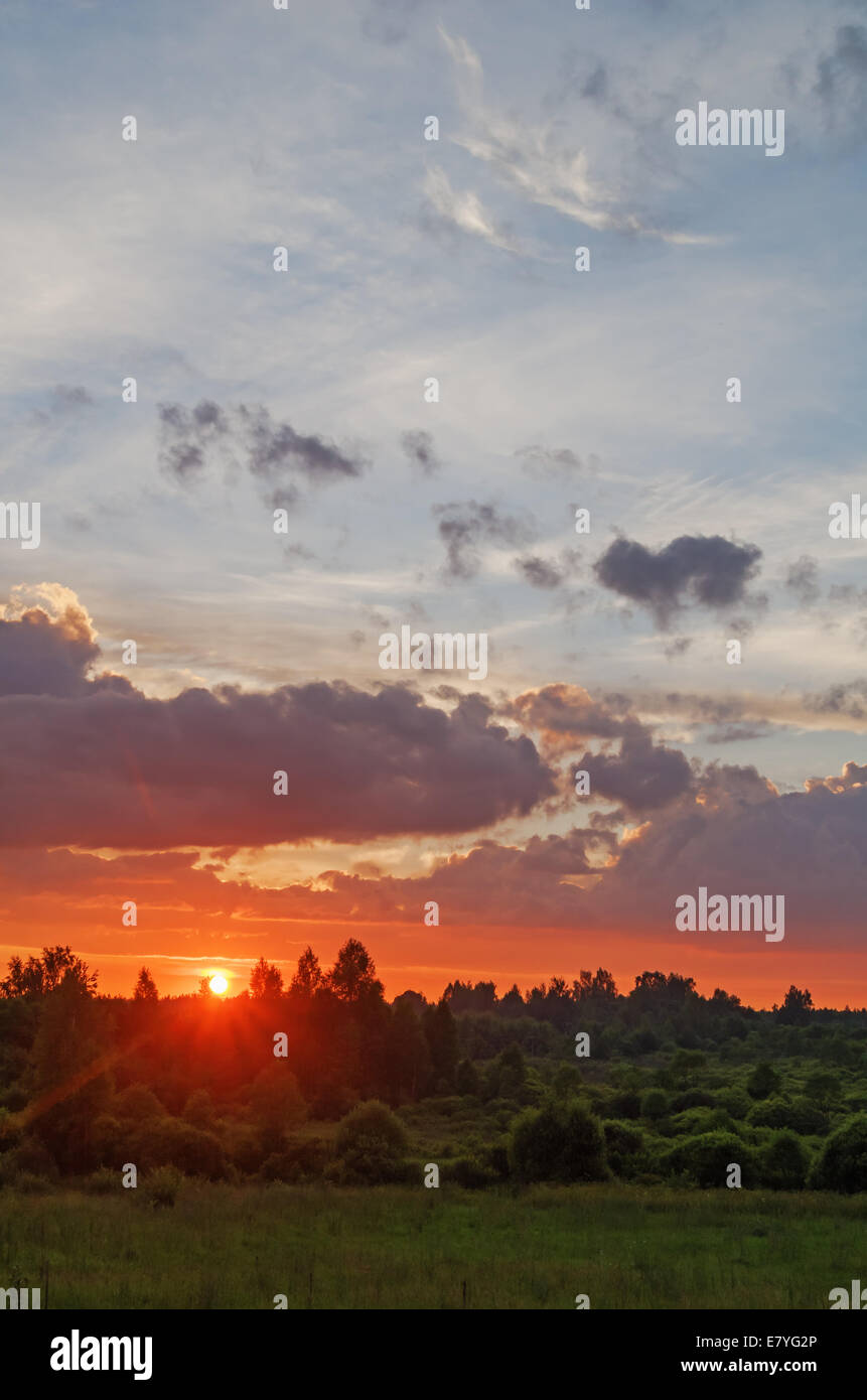 Red cloudy sunset Stock Photo - Alamy