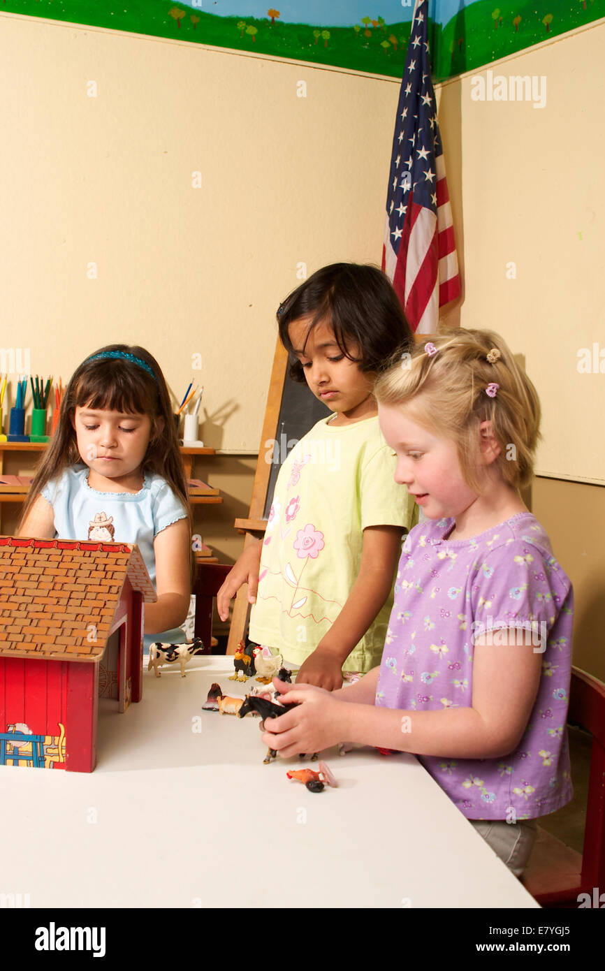 4-5 year old pre-k students student girl girls working together multi ...