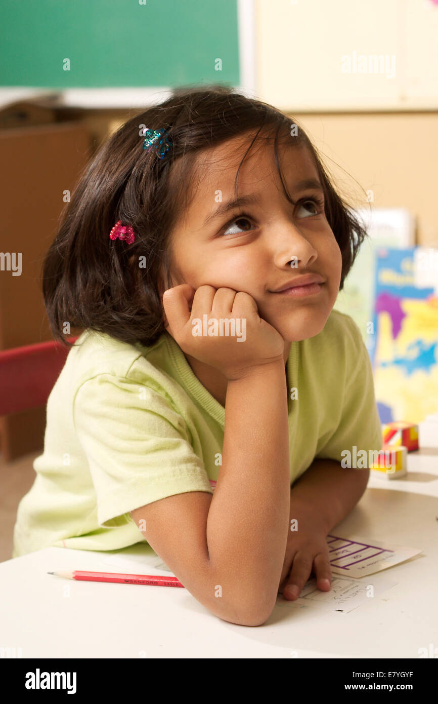 5-6 year old student girls classroom day dreaming looking up away ... 5-6 year old student girls classroom day dreaming looking up away ...