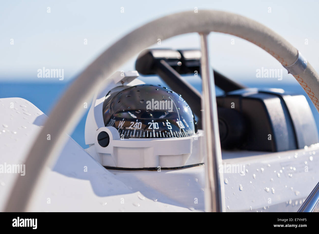 Sailing yacht control wheel and implement. Horizontal shot without ... Sailing yacht control wheel and implement. Horizontal shot without ...