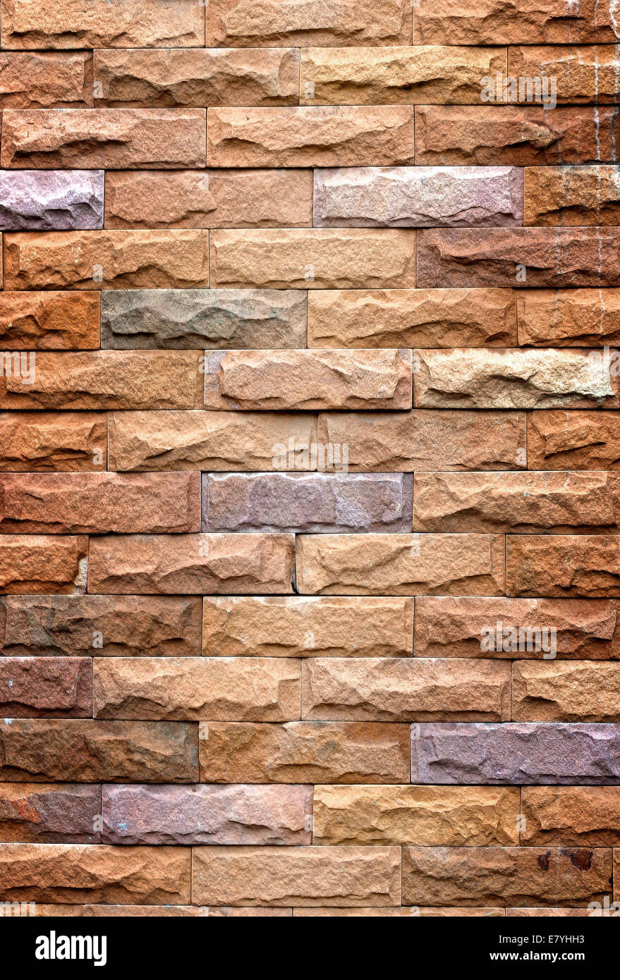 Background of stone wall made with blocks Stock Photo - Alamy