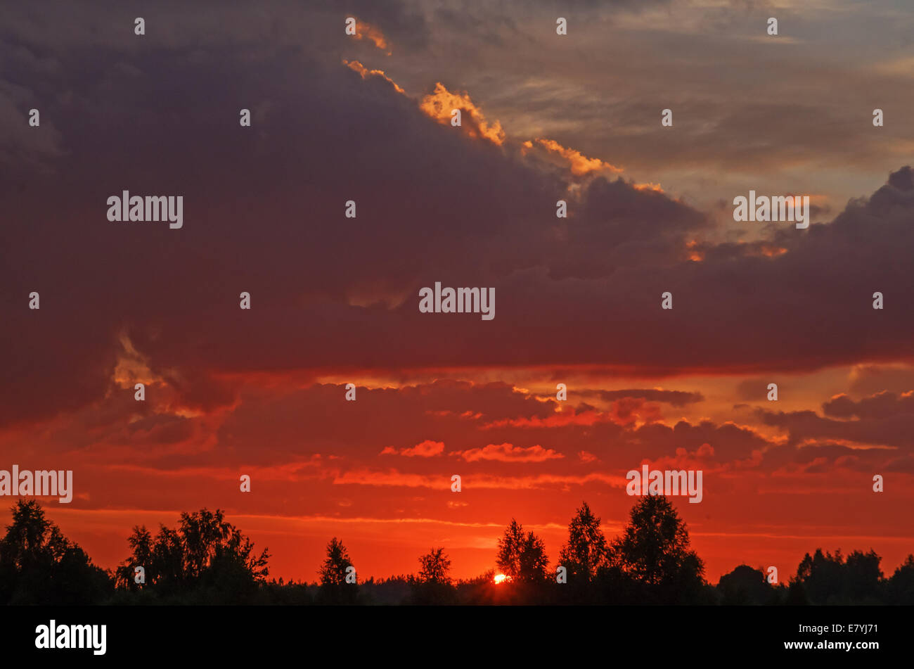 Red cloudy sunset Stock Photo - Alamy