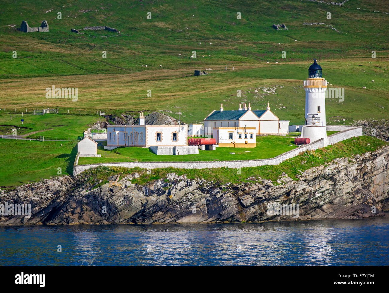 Beautiful lighthouse and buildings on the island of Bressay in the Shetland Islands in Scotland ...