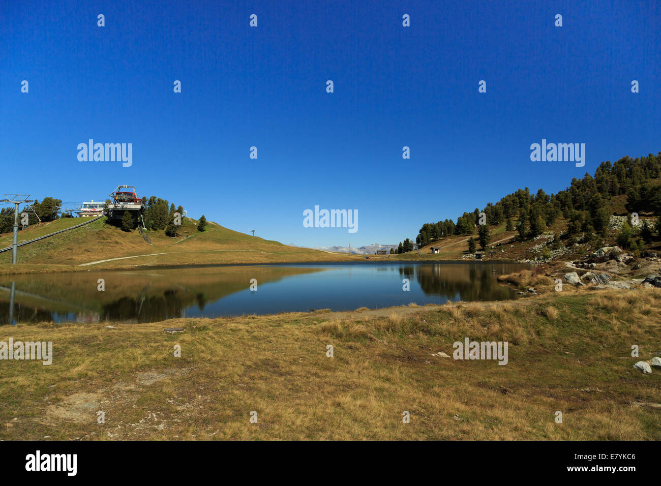 A landscape photograph of Lac Noir in Canton Valais in Switzerland. It ...