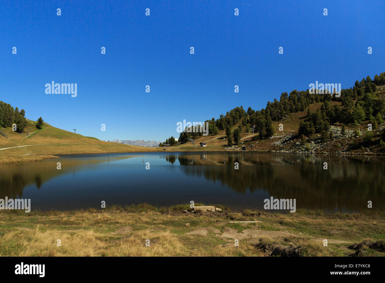A landscape photograph of Lac Noir in Canton Valais in Switzerland. It ...