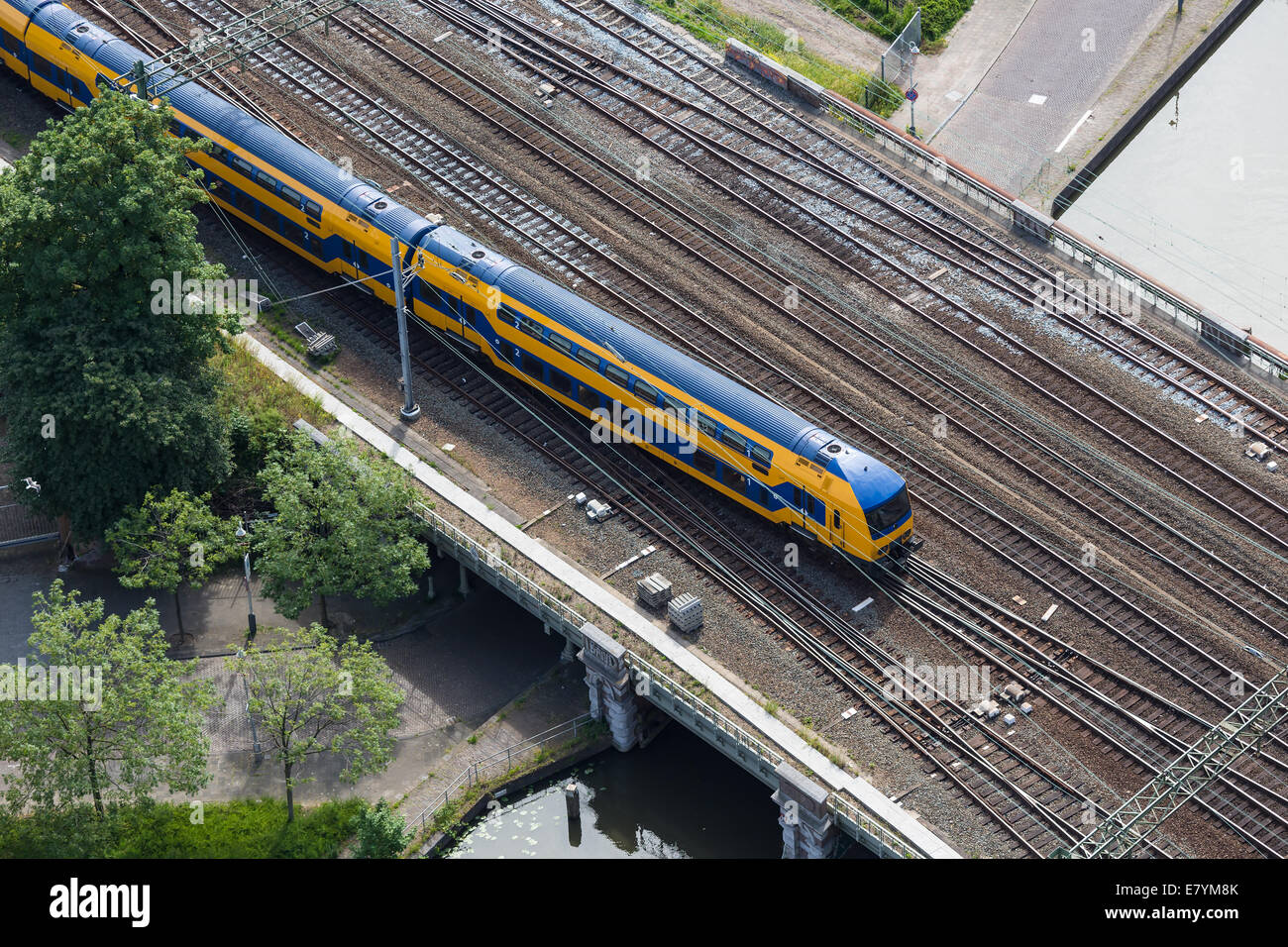Aerial view of Dutch train at a bridge crossing a canal Stock Photo - Alamy
