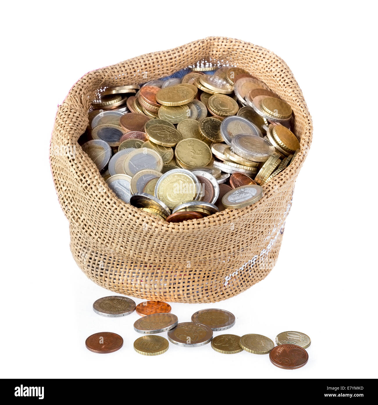 Money bag with coins isolated at a white background Stock Photo - Alamy