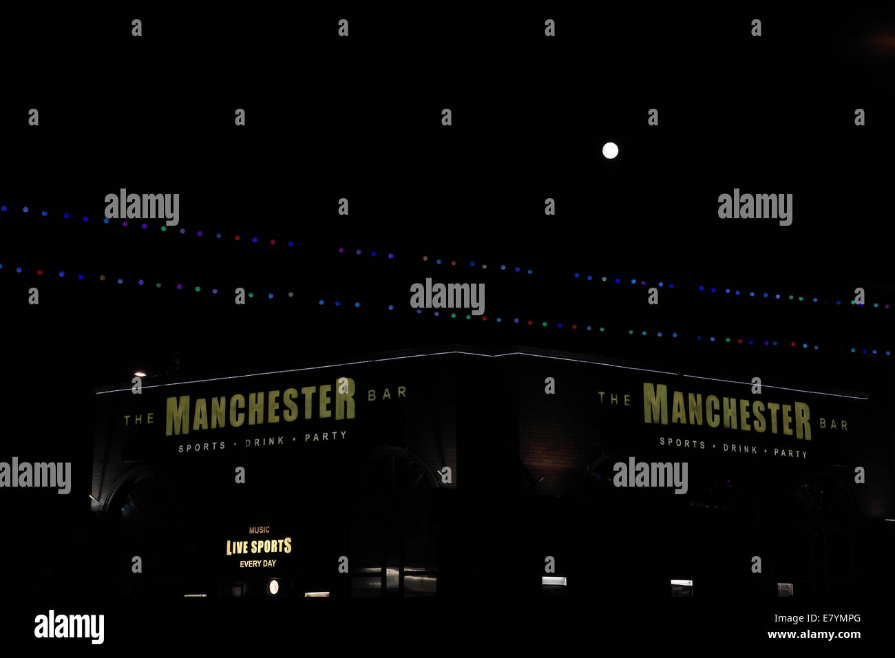 Night view full moon above electric lights Manchester Bar, Manchester ...