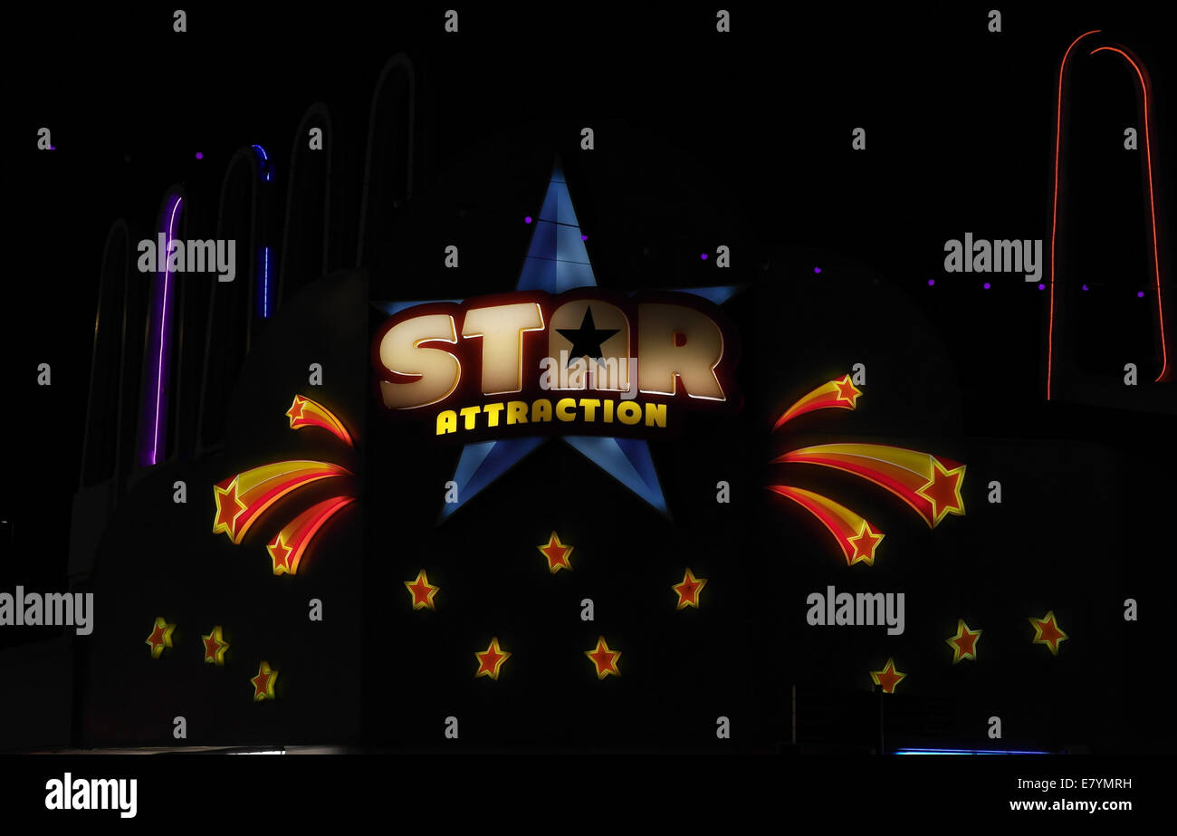 Night view colourful flashing stars sign Star Attraction Amusements ...