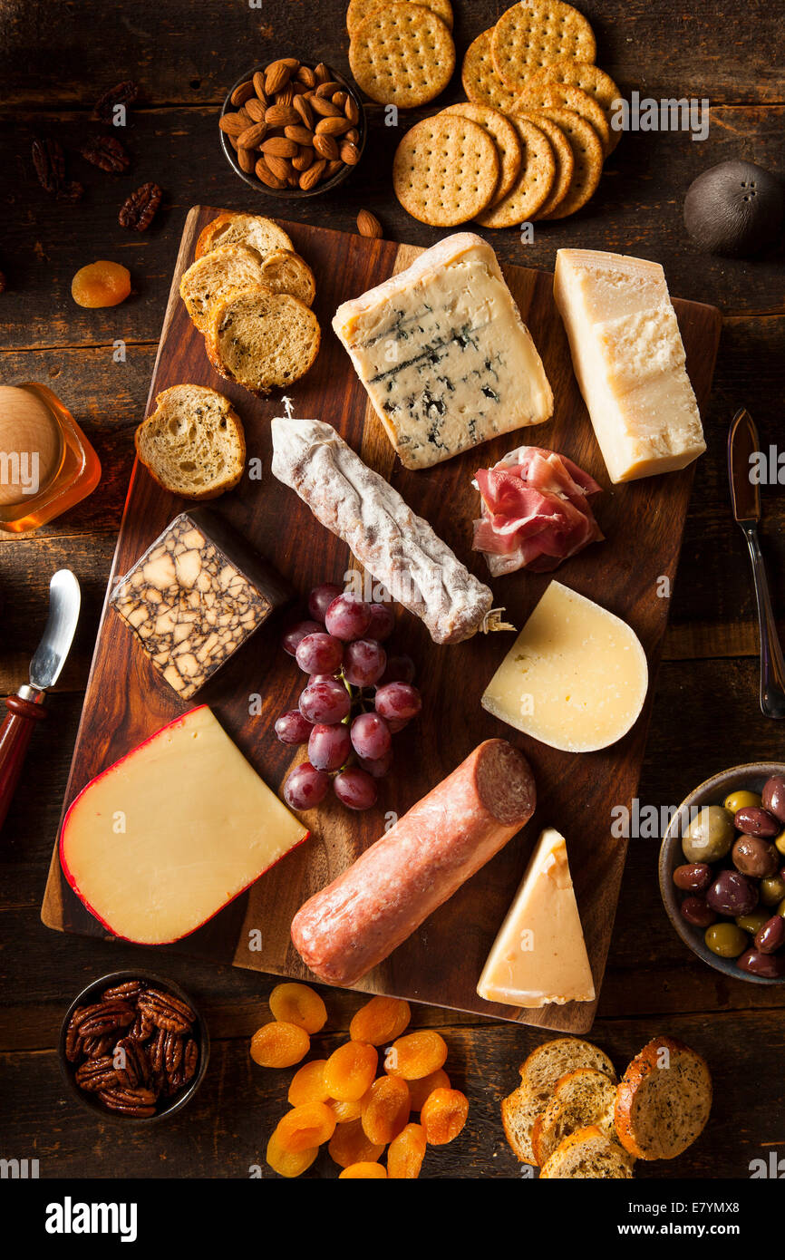 Fancy Meat and Cheeseboard with Fruit as an Appetizer Stock Photo - Alamy