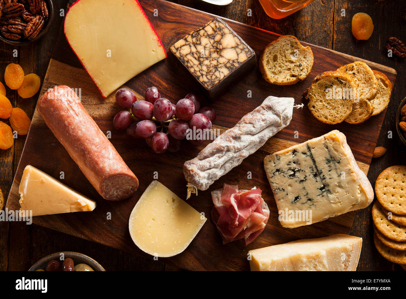 Fancy Meat and Cheeseboard with Fruit as an Appetizer Stock Photo - Alamy