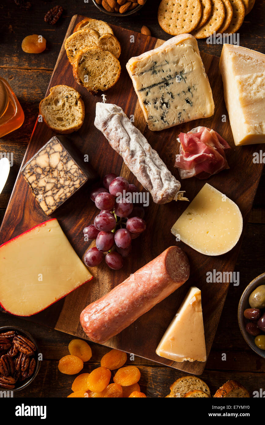 Fancy Meat and Cheeseboard with Fruit as an Appetizer Stock Photo - Alamy