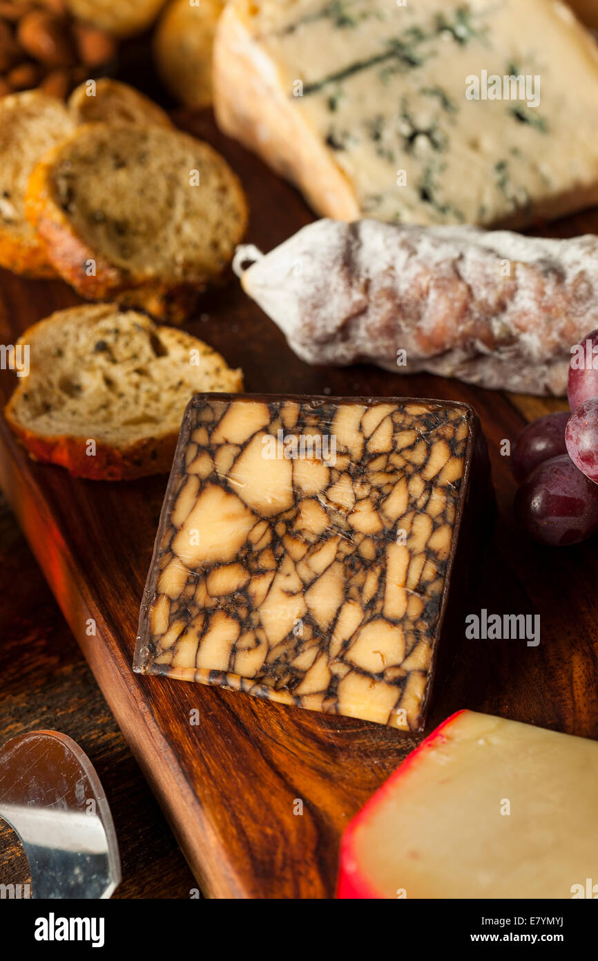 Fancy Meat and Cheeseboard with Fruit as an Appetizer Stock Photo - Alamy