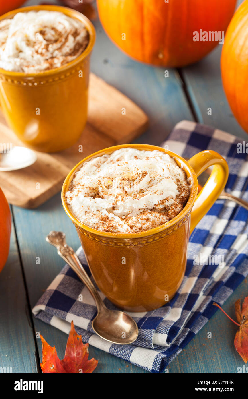 Autumn Pumpkin Spice Latte with Milk and Cream Stock Photo - Alamy