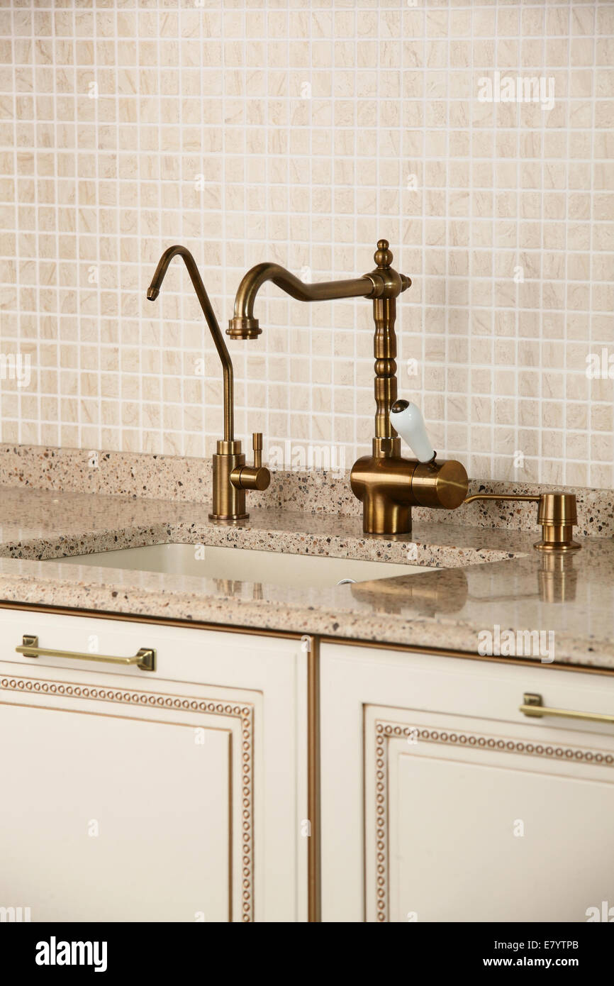 stainless steel water tap in modern interior Stock Photo - Alamy