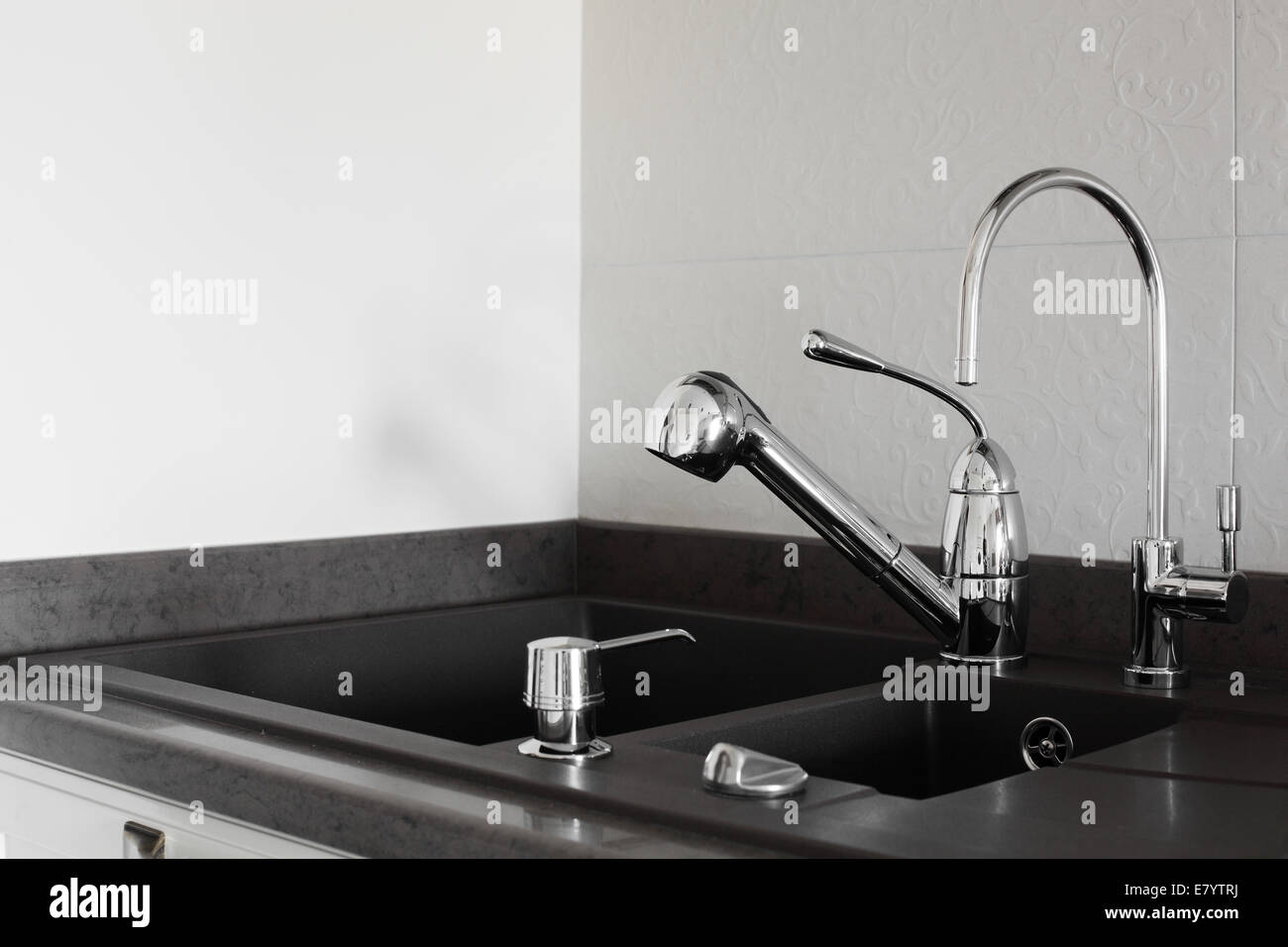 bright and stylish european chrome water tap Stock Photo - Alamy