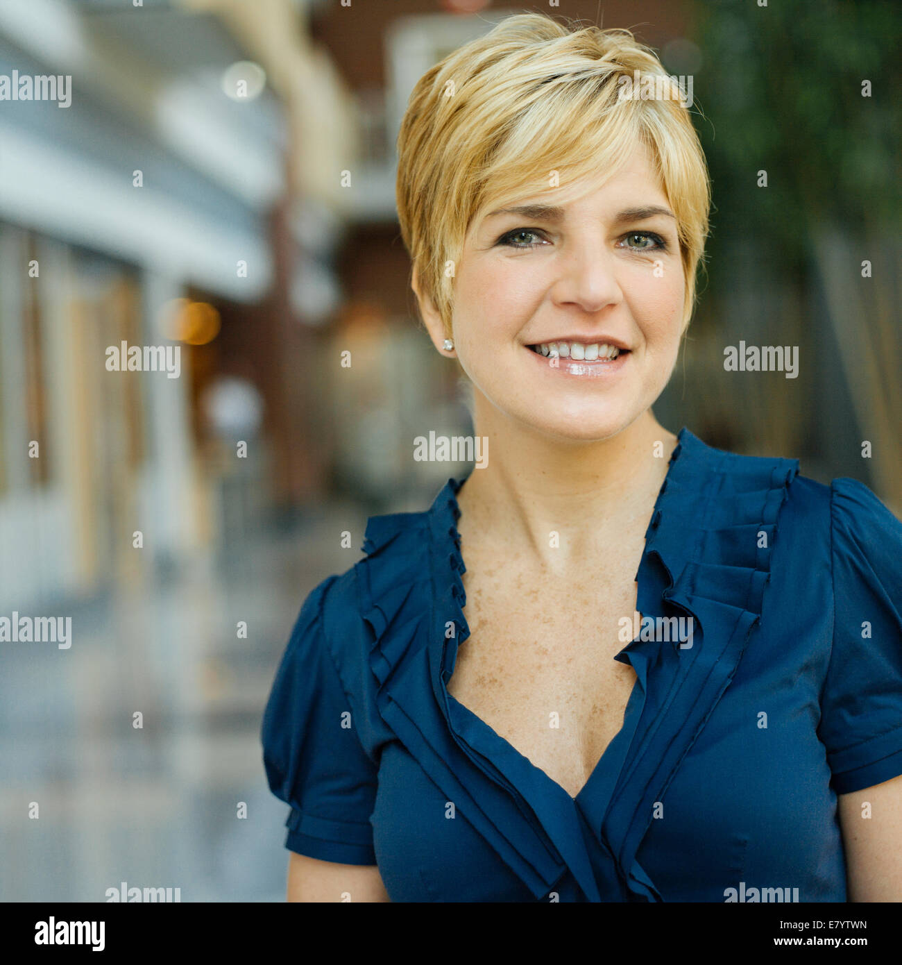 Portrait of smiling middle-aged woman Stock Photo - Alamy