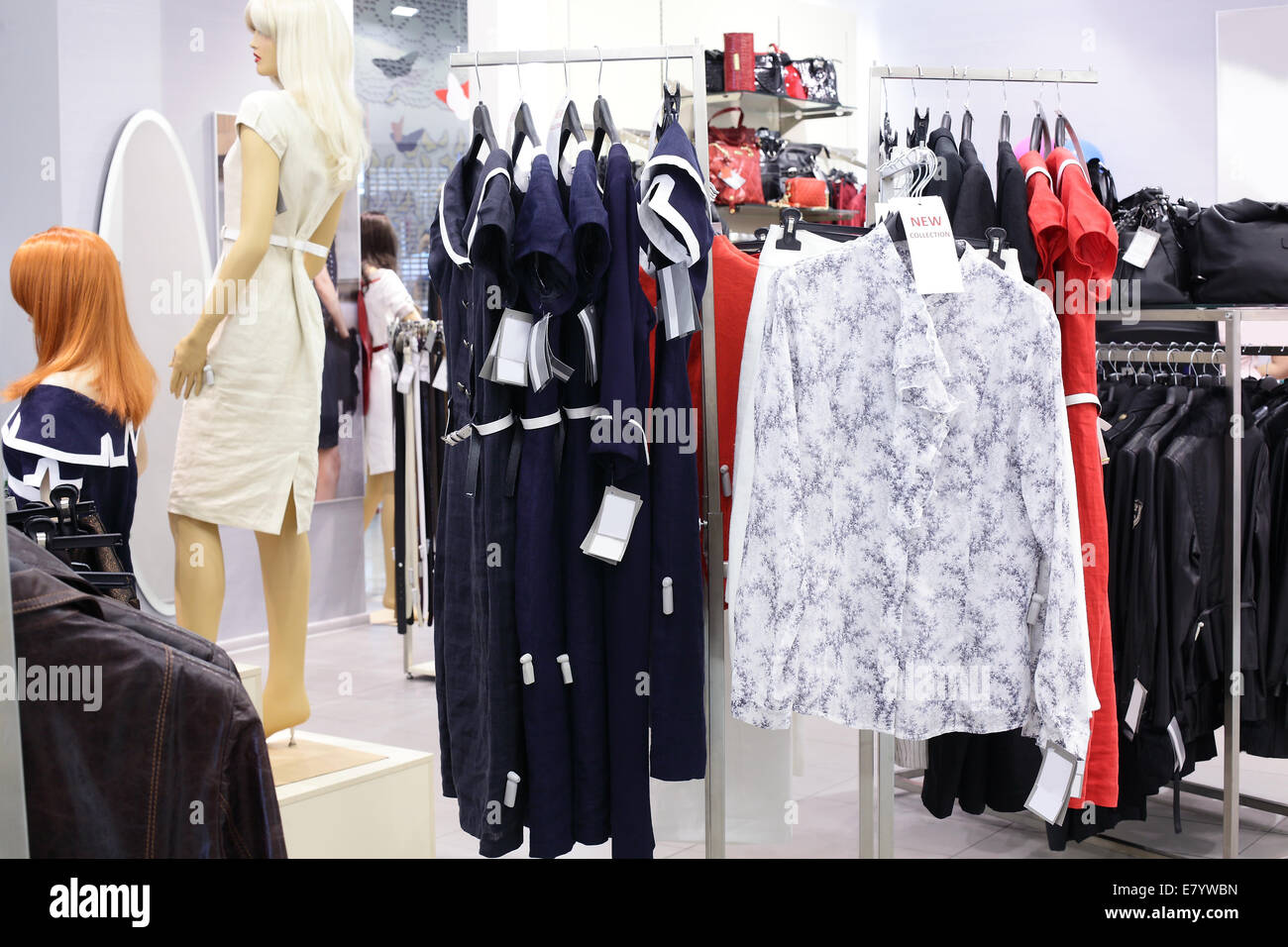 luxury and fashionable brand new interior of cloth store Stock Photo ...