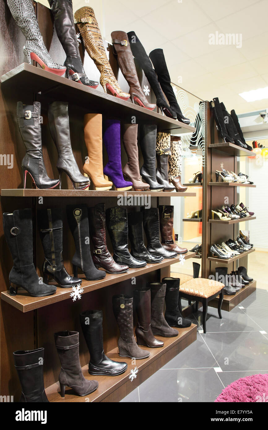 bright and fashionable interior of shoe store in modern mall Stock ...