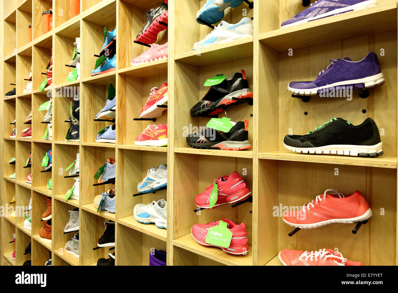 bright and fashionable interior of shoe store in modern mall Stock ...