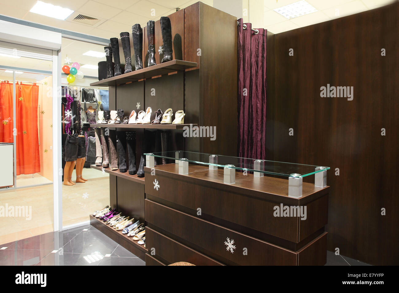 bright and fashionable interior of shoe store in modern mall Stock ...