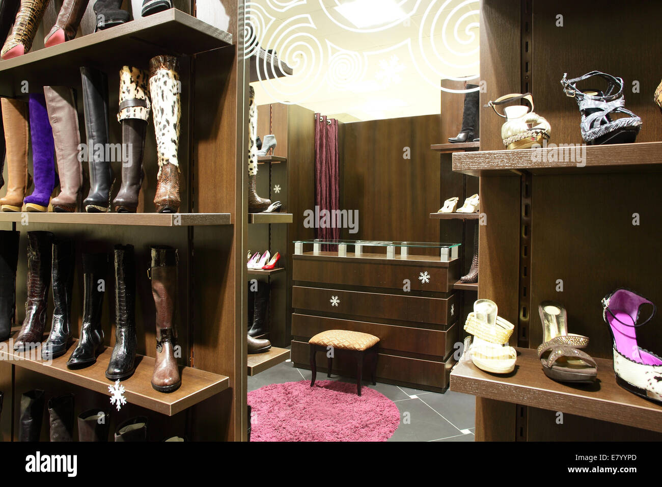 bright and fashionable interior of shoe store in modern mall Stock ...