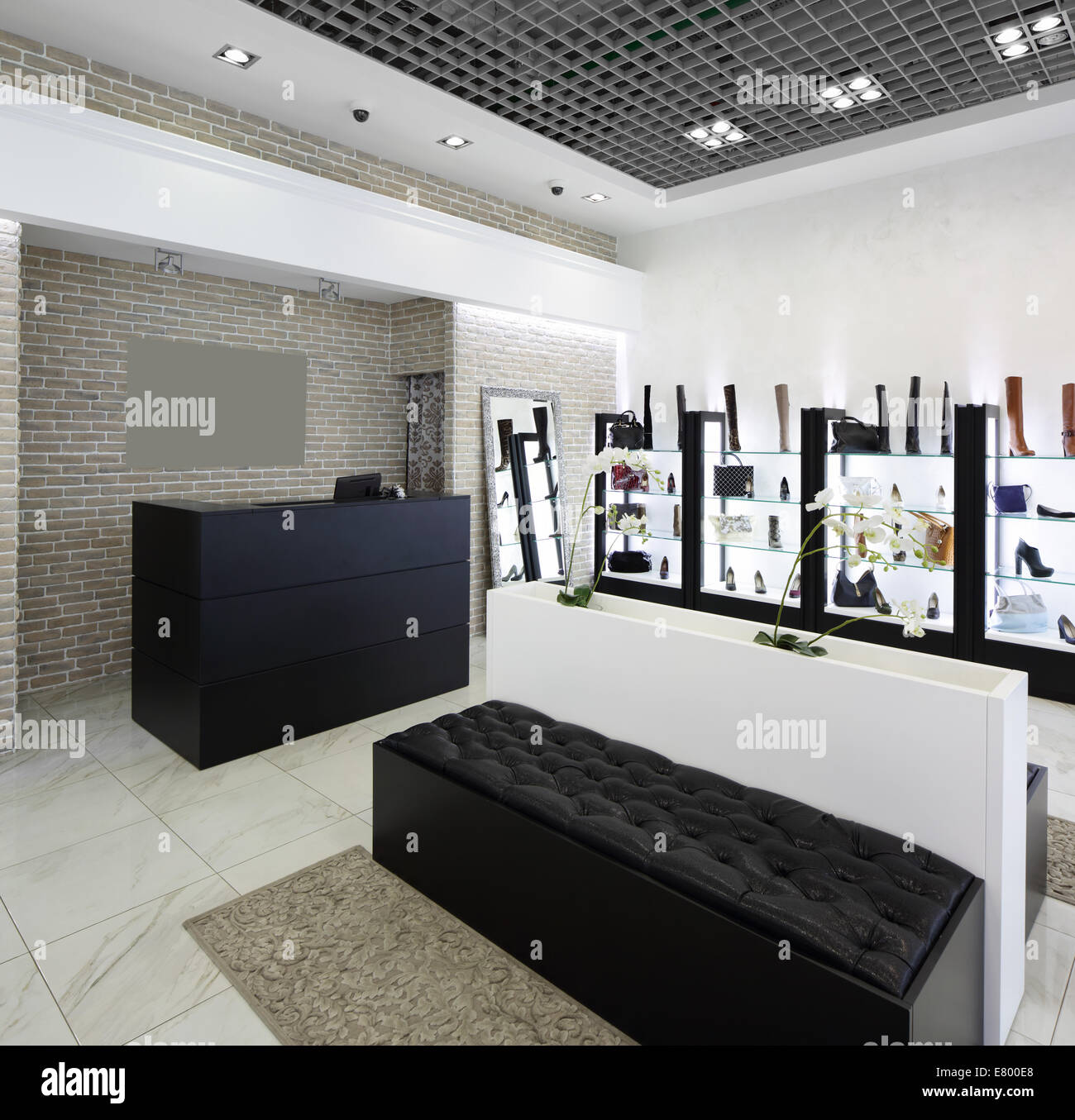 bright and fashionable interior of shoe store in modern mall Stock ...