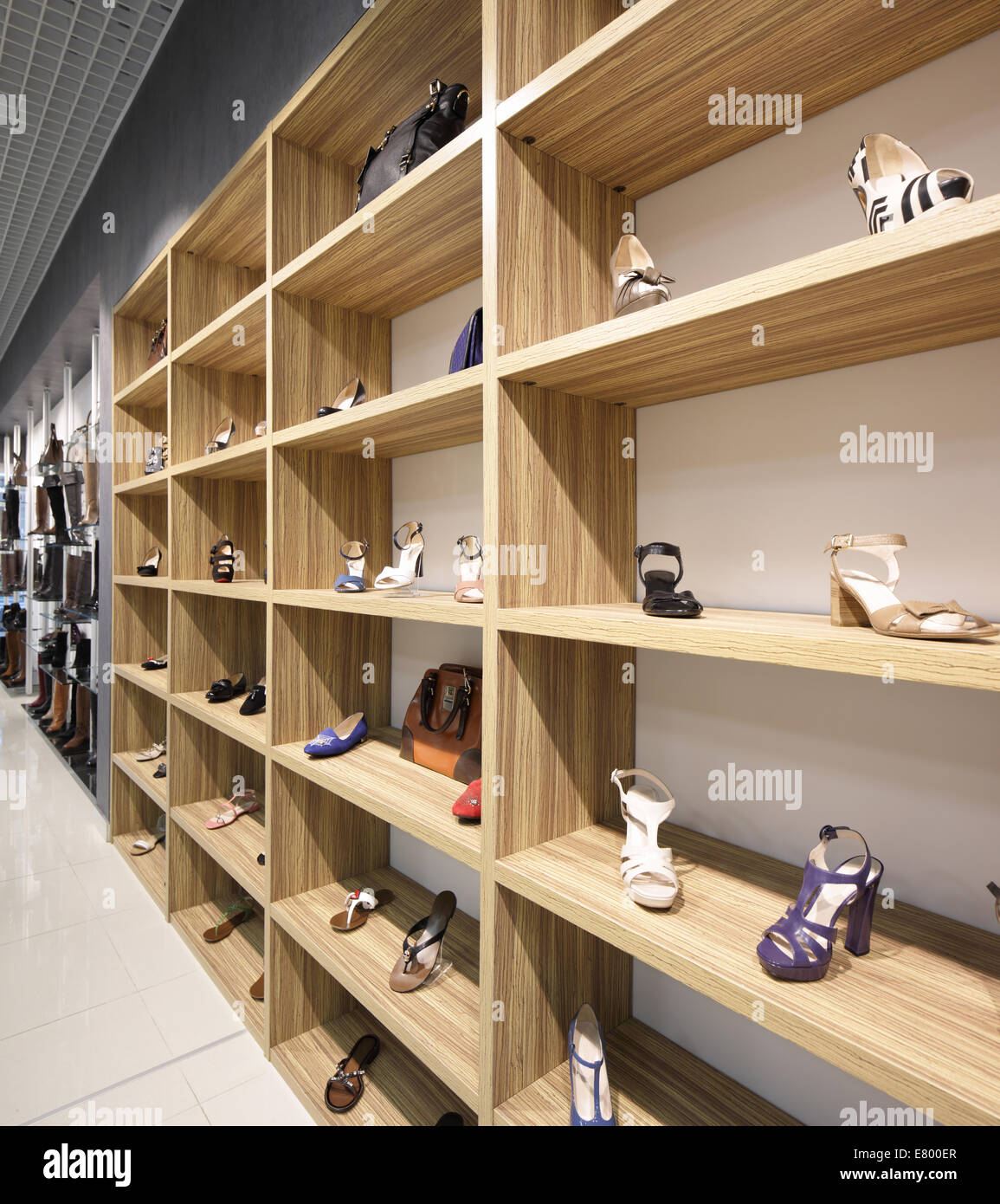 bright and fashionable interior of shoe store in modern mall Stock ...