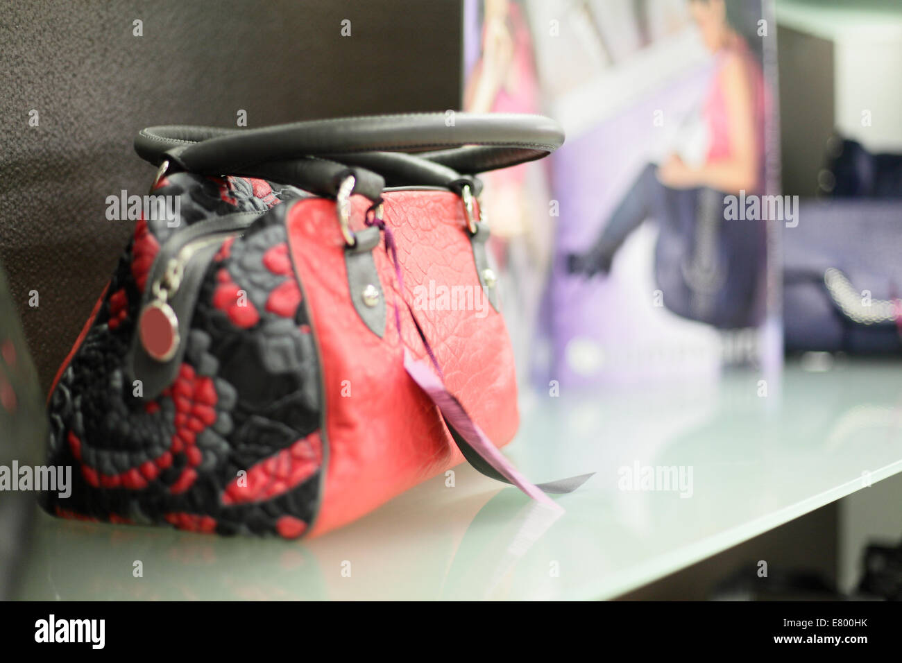 bright and fashionable interior of bag store in modern mall Stock Photo ...