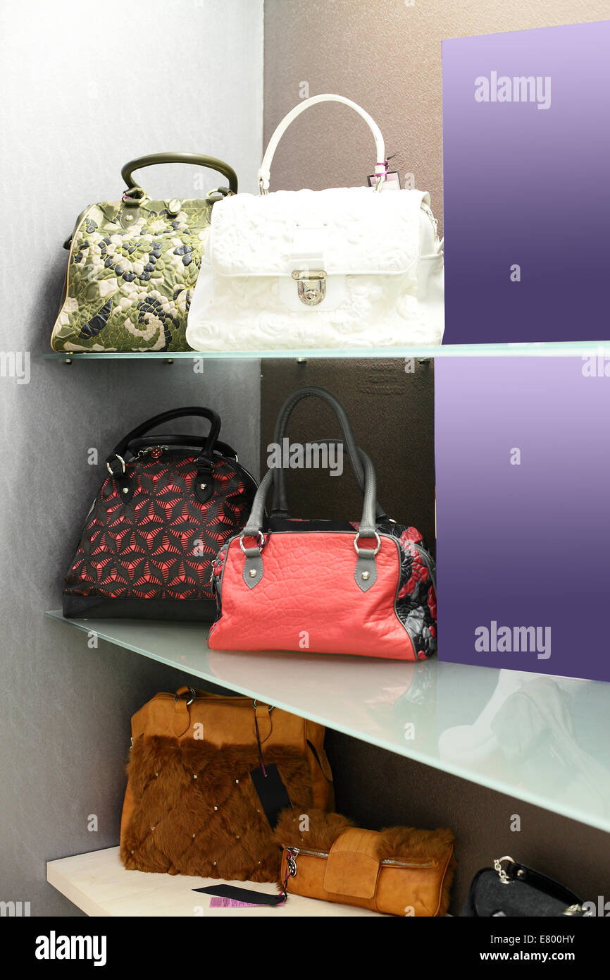 bright and fashionable interior of bag store in modern mall Stock Photo ...