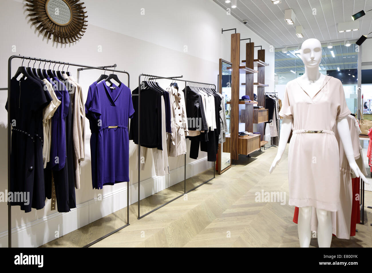 luxury and fashionable brand new interior of cloth store Stock Photo ...