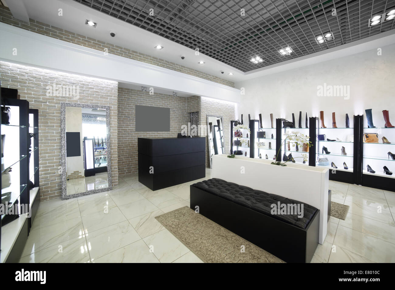 bright and fashionable interior of shoe store in modern mall Stock Photo - Alamy