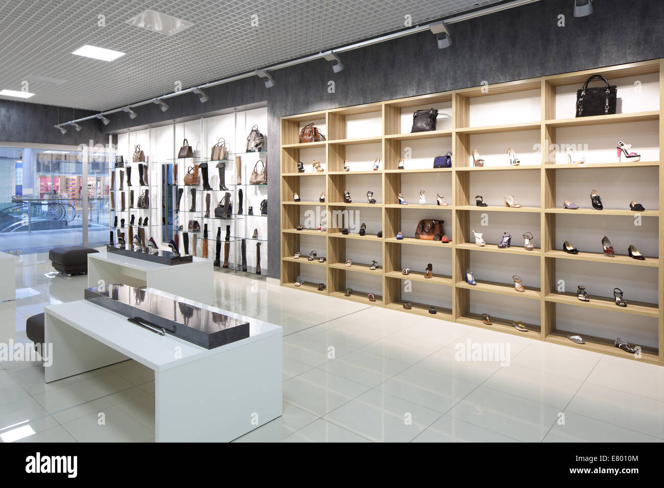 bright and fashionable interior of shoe store in modern mall Stock ...