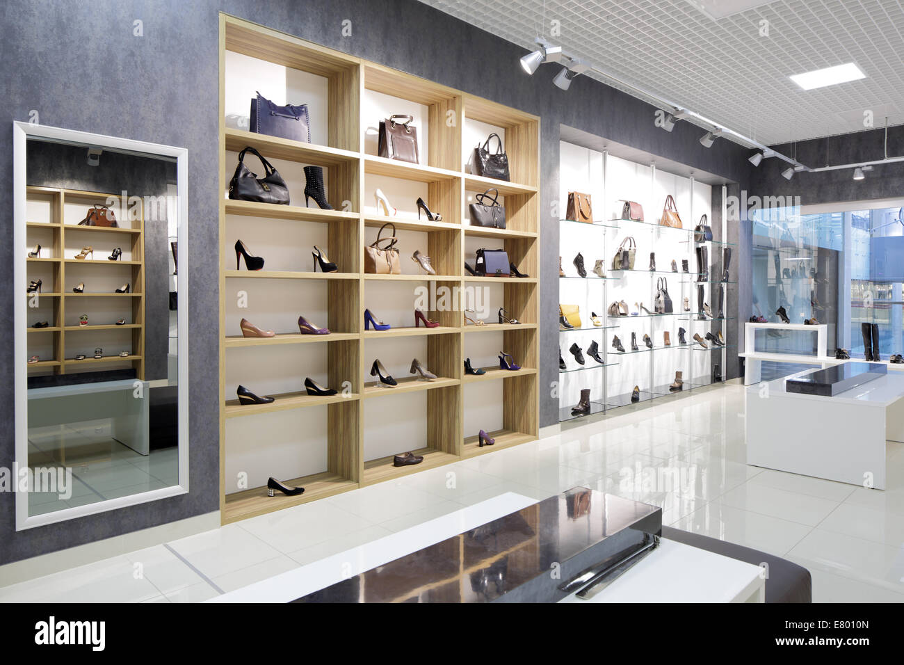 bright and fashionable interior of shoe store in modern mall Stock ...
