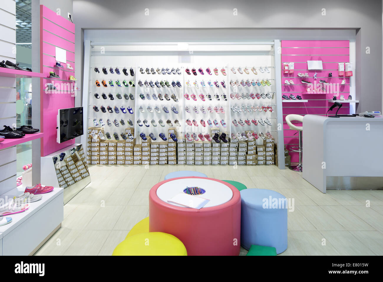 bright and fashionable interior of shoe store in modern mall Stock ...