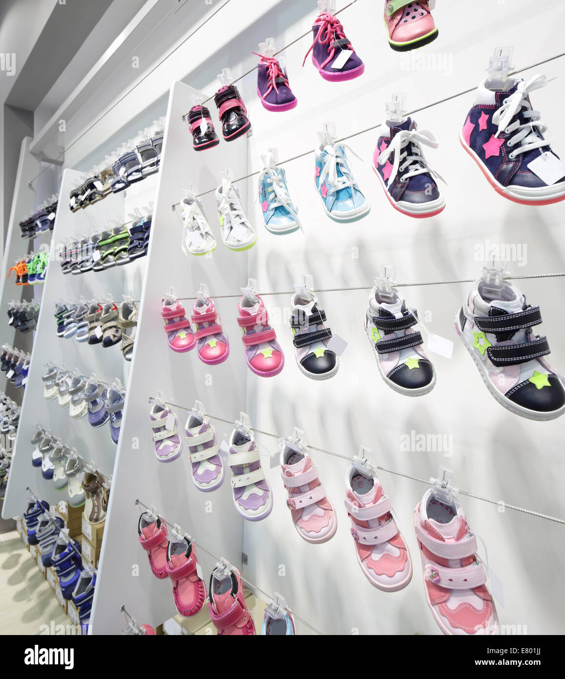 bright and fashionable interior of shoe store in modern mall Stock ...