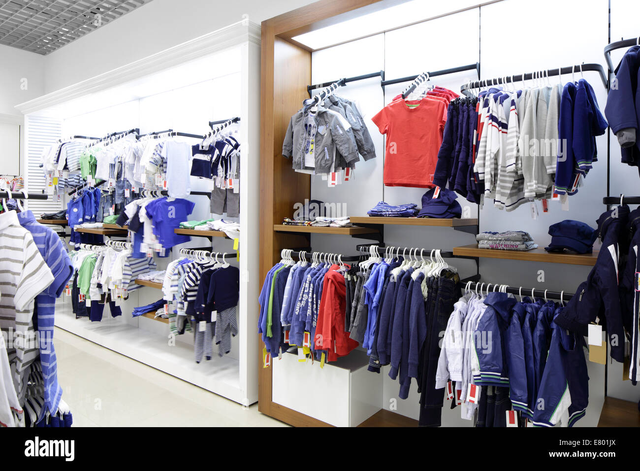 luxury and fashionable brand new interior of cloth store Stock Photo ...