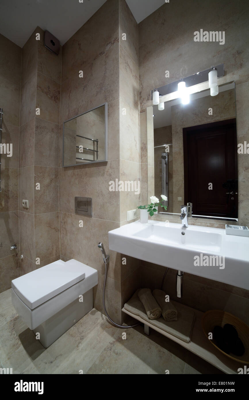 beautiful and modern interior of bright cloakroom Stock Photo - Alamy