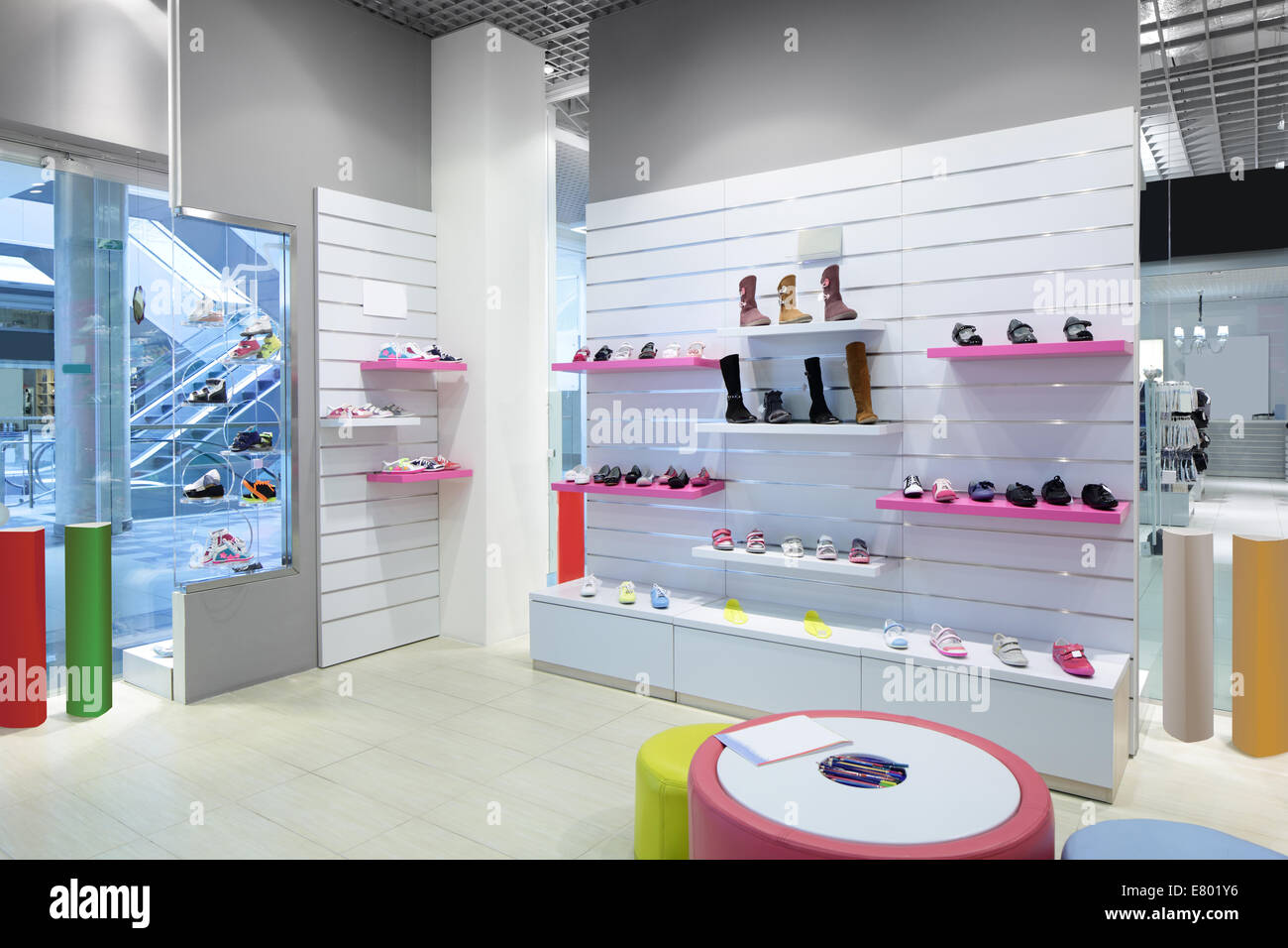 bright and fashionable interior of shoe store in modern mall Stock ...