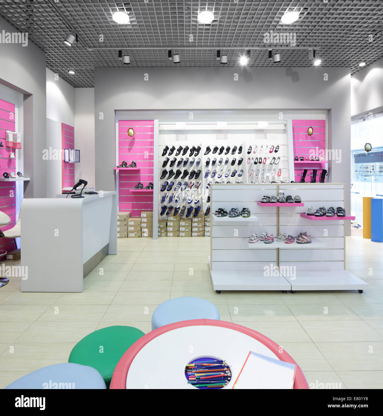 bright and fashionable interior of shoe store in modern mall Stock ...