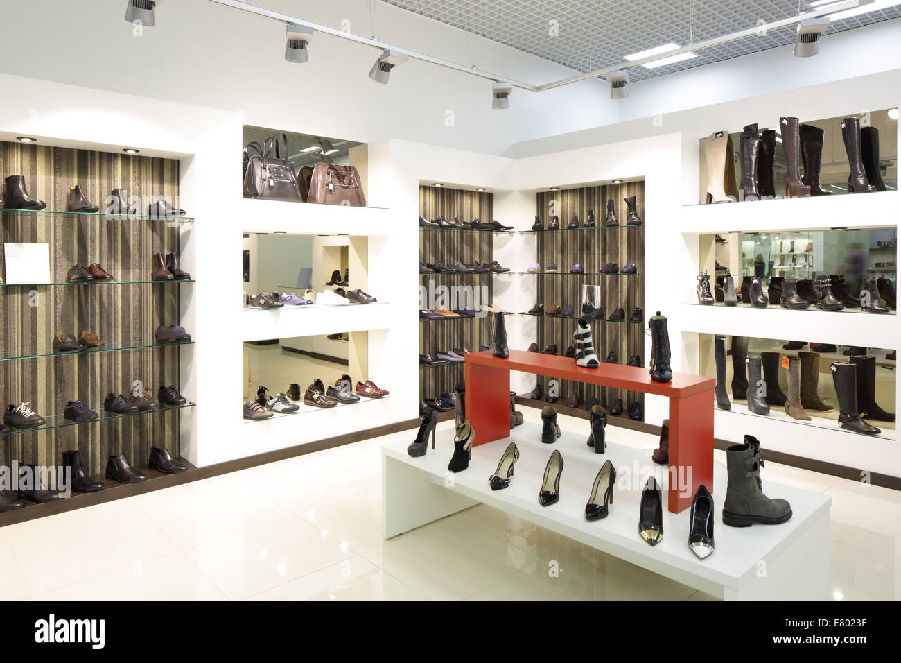 bright and fashionable interior of shoe store in modern mall Stock ...