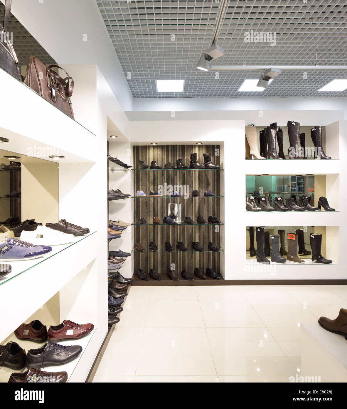 bright and fashionable interior of shoe store in modern mall Stock ...